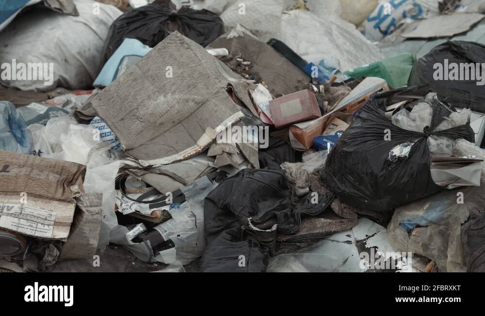 Garbage dump, various trash and waste material, environmental pollution ...