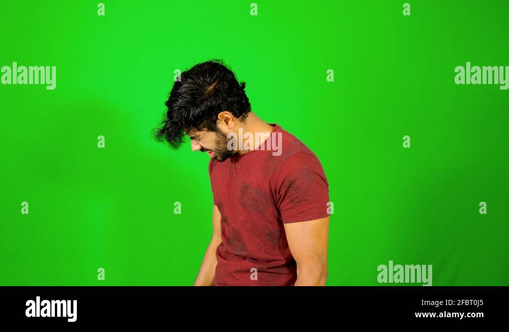 Indian man shy with green background Indian green screen Stock Video ...