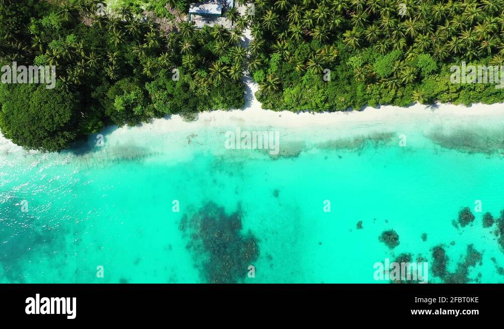 Overhead footage of the coast of a resort island in the Philippines ...