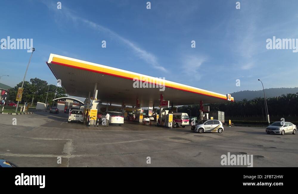 Shell petrol station at night. Customers come to visit this petrol ...
