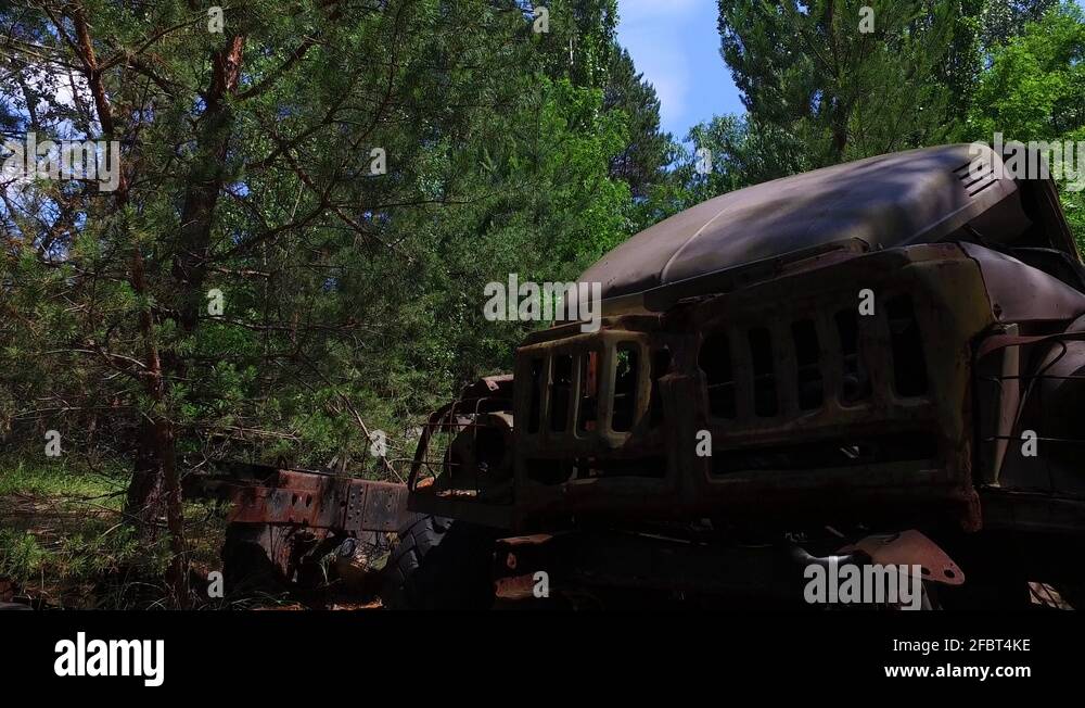 PAN RIGHT: Wrecked fire truck at scrapyard outside Chernobyl Nuclear ...