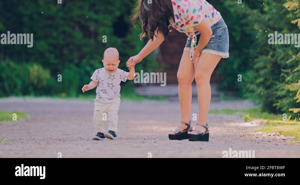 Walking baby crying Stock Videos & Footage - HD and 4K Video Clips - Alamy