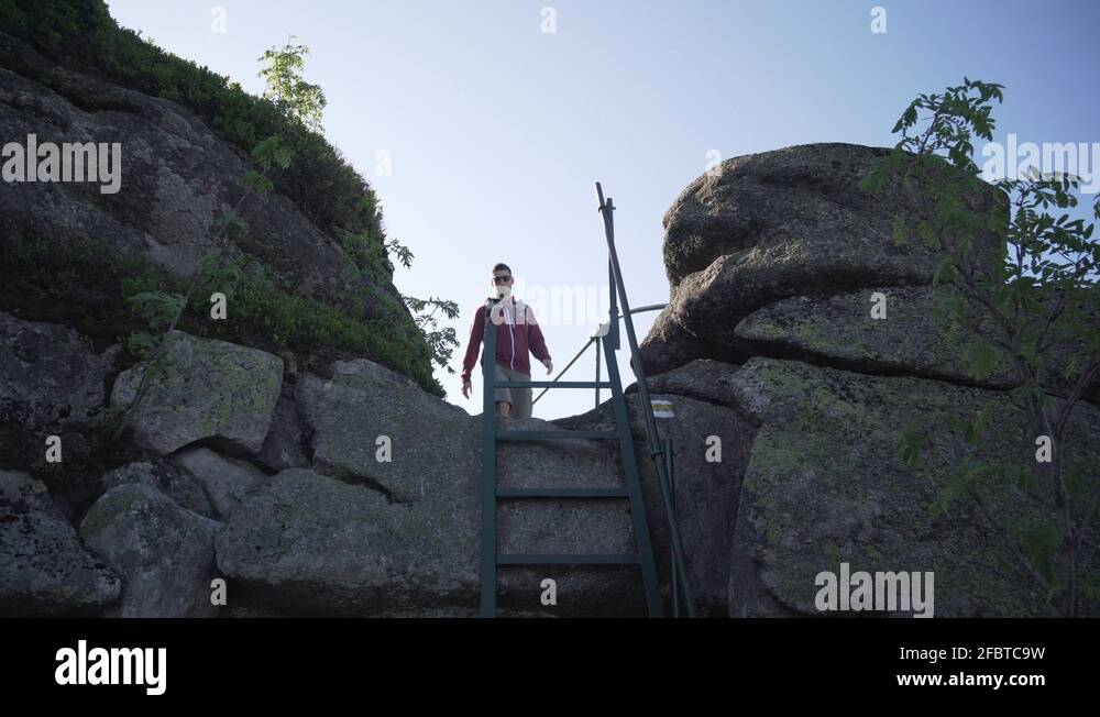 Climbing down a mountain ladder Stock Videos & Footage - HD and 4K ...