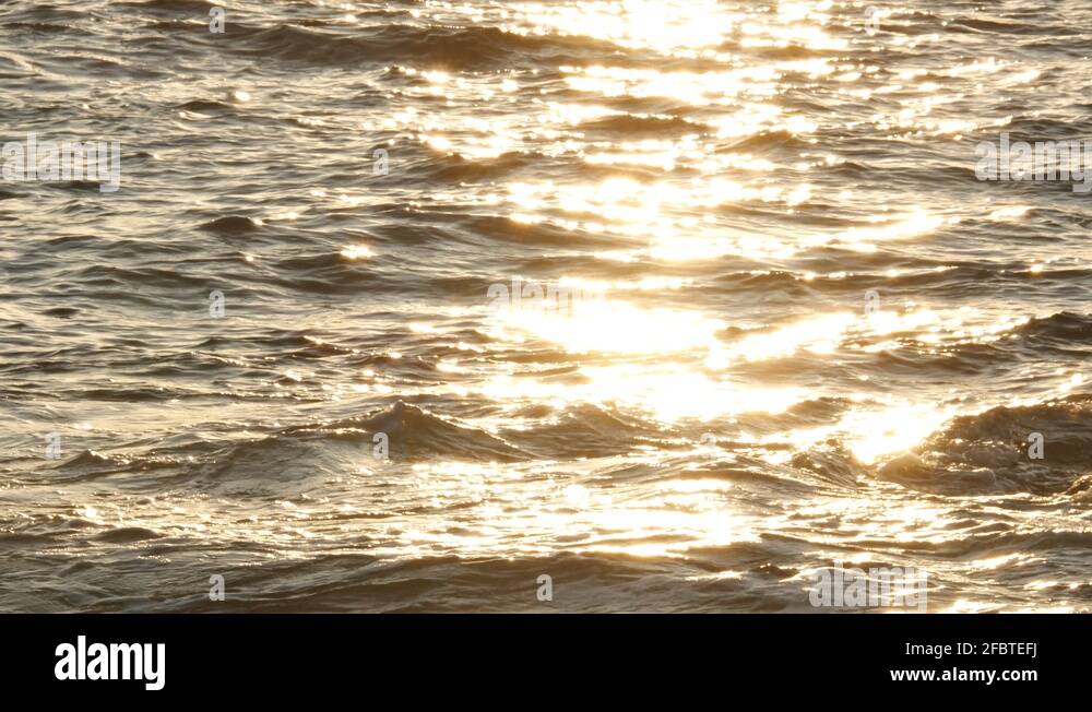 Sun glinting on the waves Stock Videos & Footage - HD and 4K Video ...