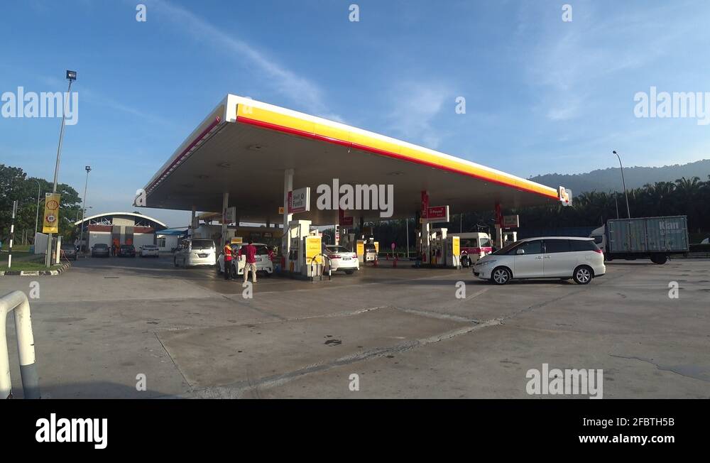 Shell petrol station at night. Customers come to visit this petrol ...