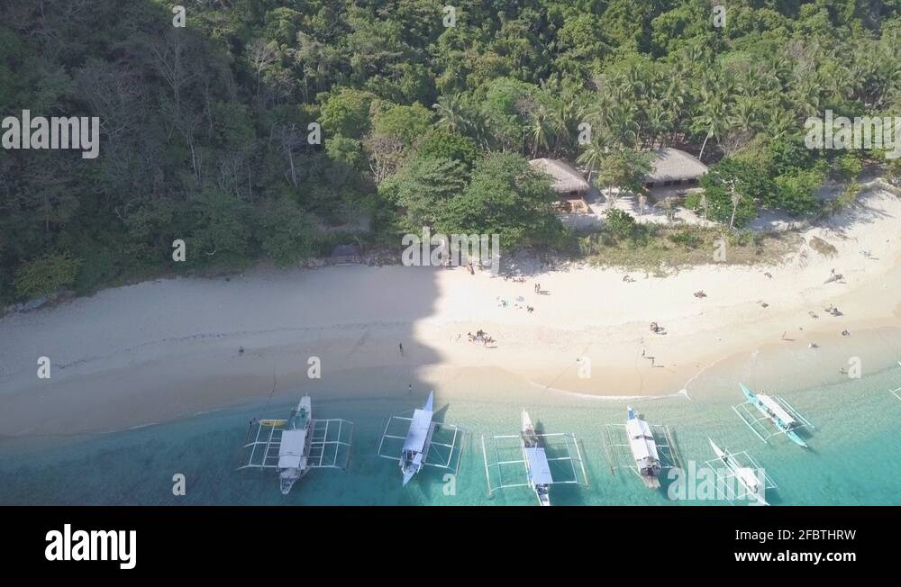 Revealing beautiful Palawan island and boats in the ocean Stock Video ...