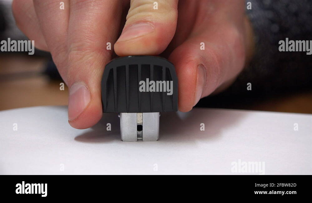 Stapled paper Stock Videos & Footage - HD and 4K Video Clips - Alamy
