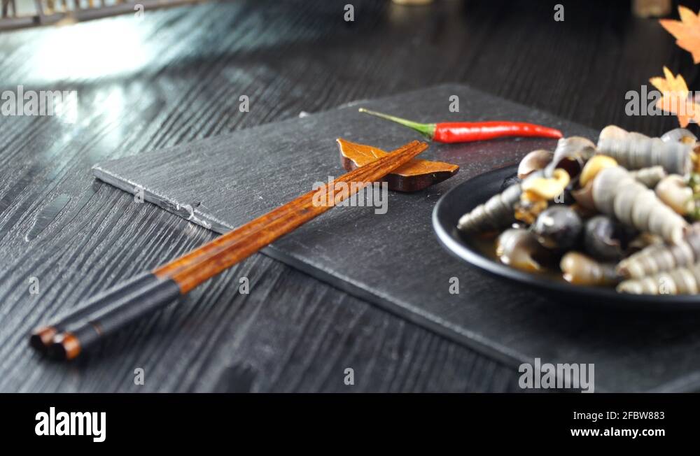 Chinese food river snails Stock Video Footage - Alamy