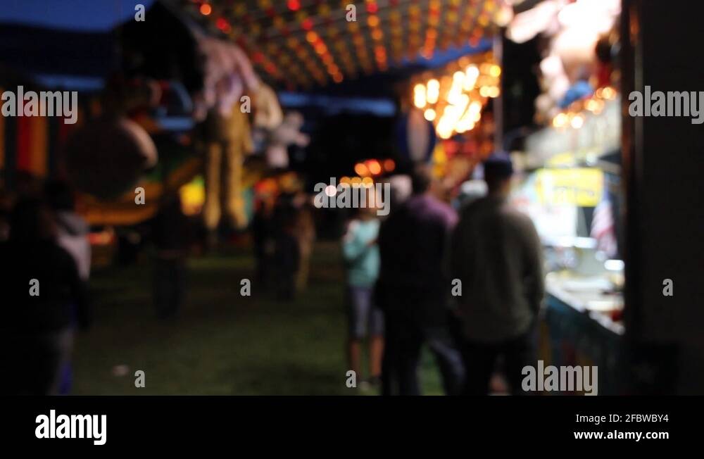 People Playing Carnival Games Stock Video Footage - Alamy