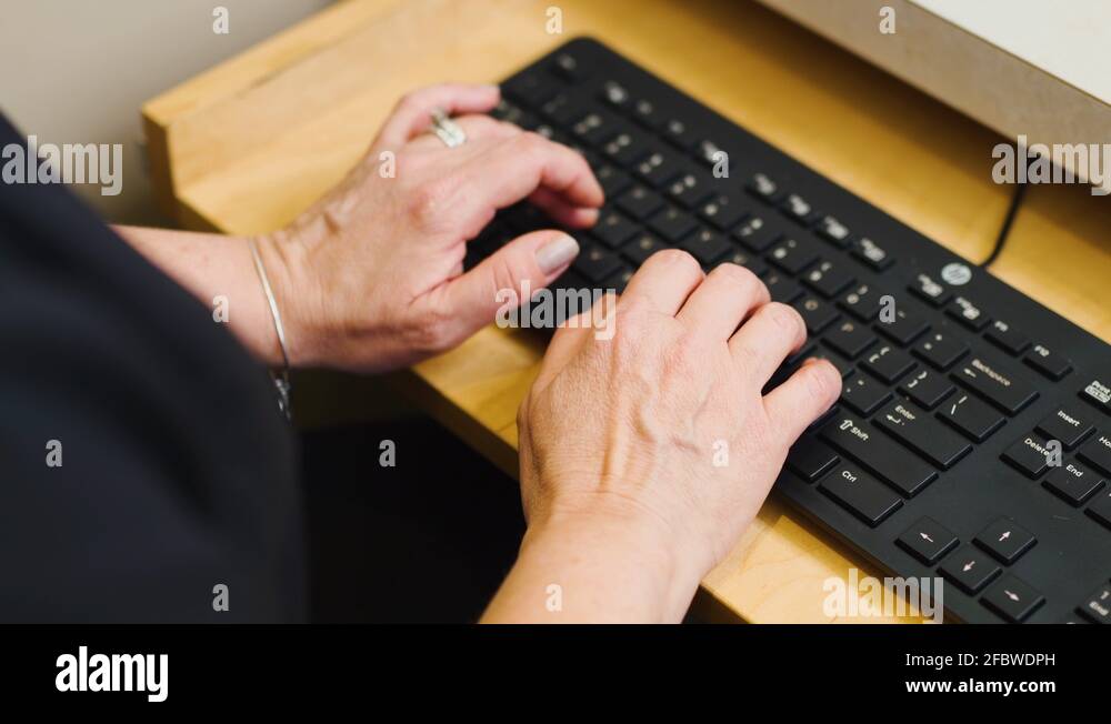 Secretary typing on a keyboard Stock Video Footage - Alamy