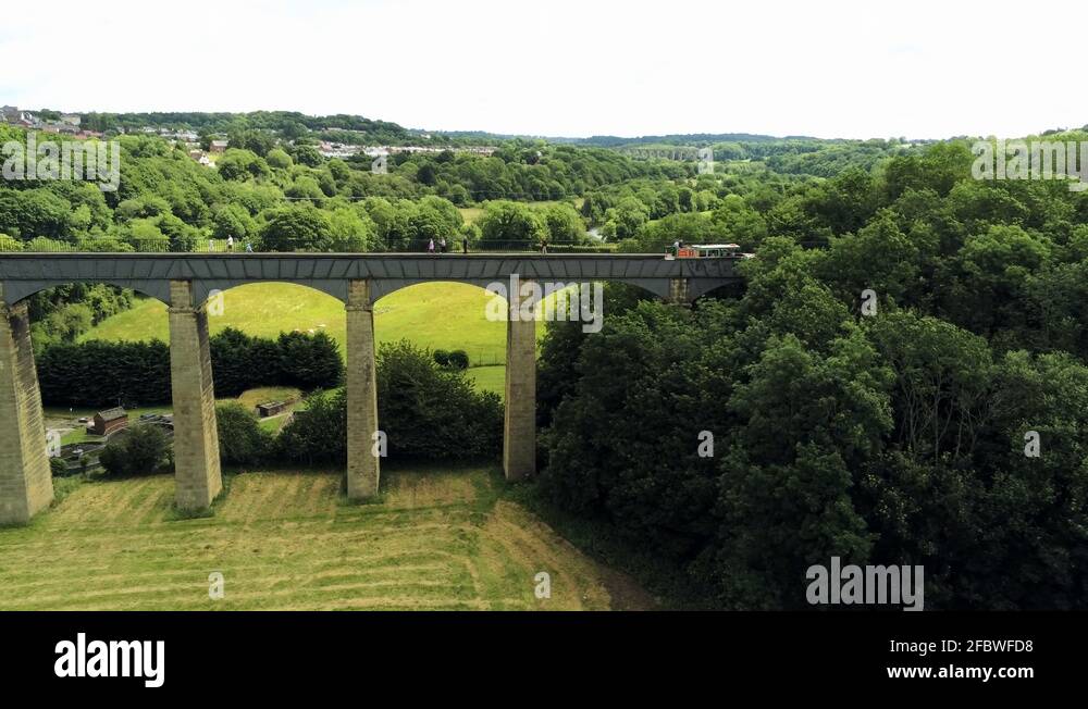 Pontcysyllte Aqueduct arch bridge canal waterway crossing. Aerial dolly ...