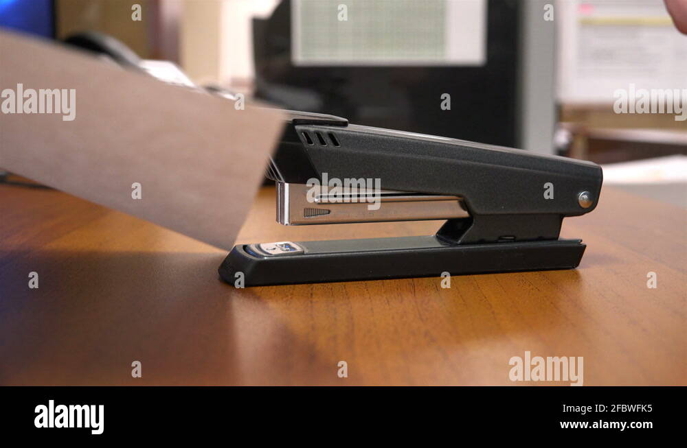 Stapler and paper Stock Videos & Footage - HD and 4K Video Clips - Alamy