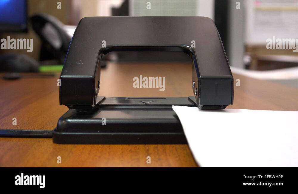 Document hole punch Stock Videos & Footage - HD and 4K Video Clips - Alamy