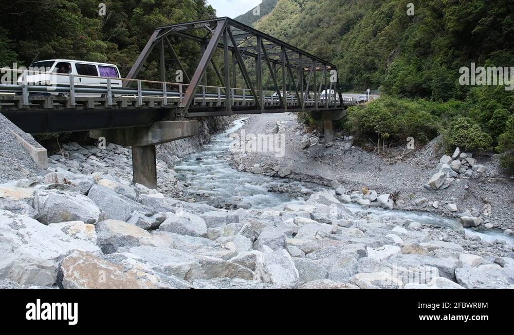 cars travelling over a Bailey Bridge in the southern Alps of New ...