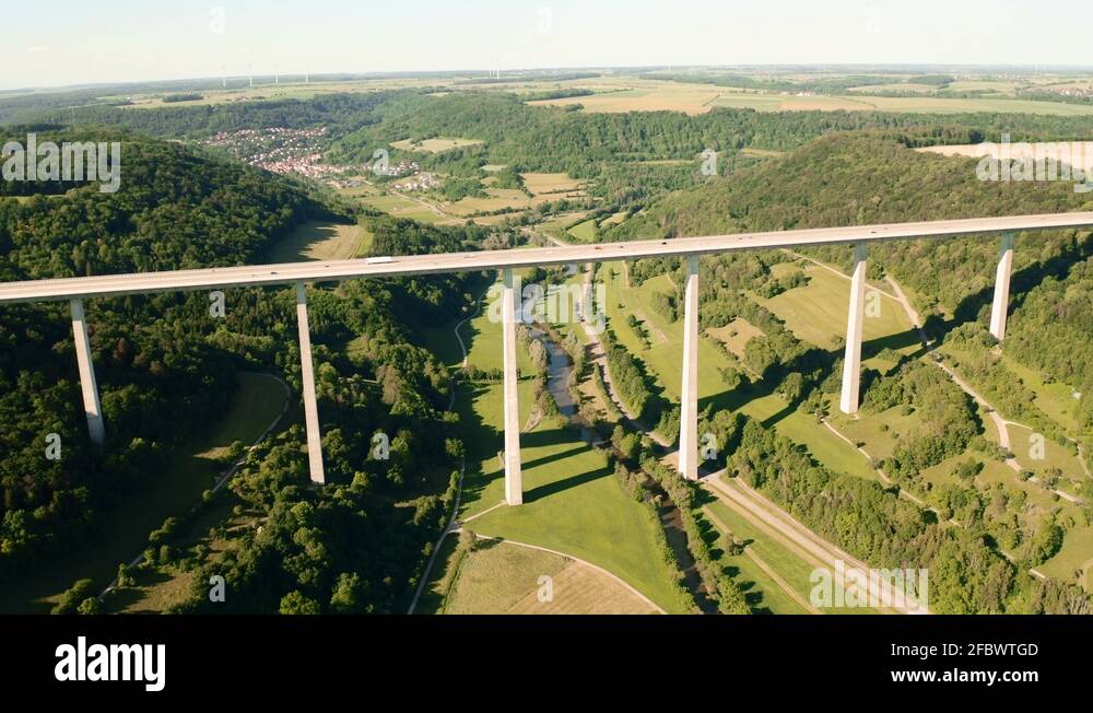 High, wide aerial view of the tallest bridge in Germany, the Kochertal ...