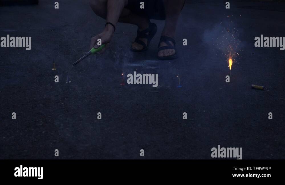 A man lighting fireworks Stock Videos & Footage - HD and 4K Video Clips ...
