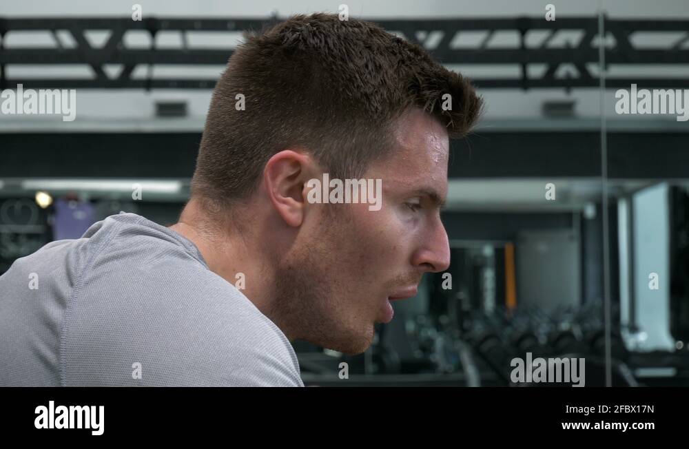 Young Fitness Man Breathing Heavy After Hard Workout Stock Video ...