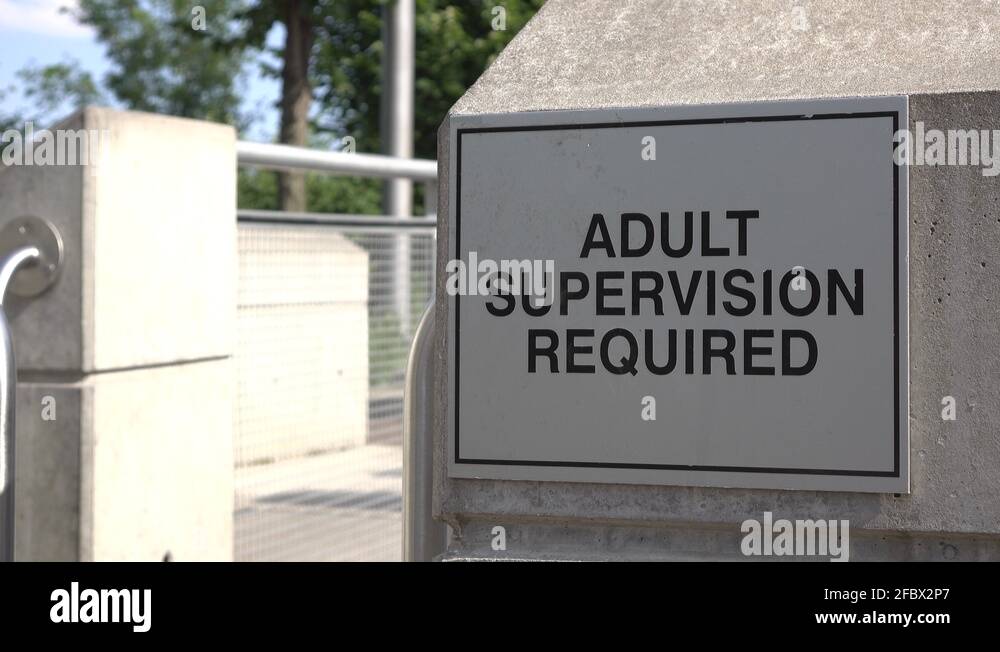 Adult supervision required sign at playground 4k Stock Video Footage ...