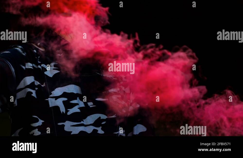 cinemagraph, animated photo of girl waving smoke bomb in front of her ...