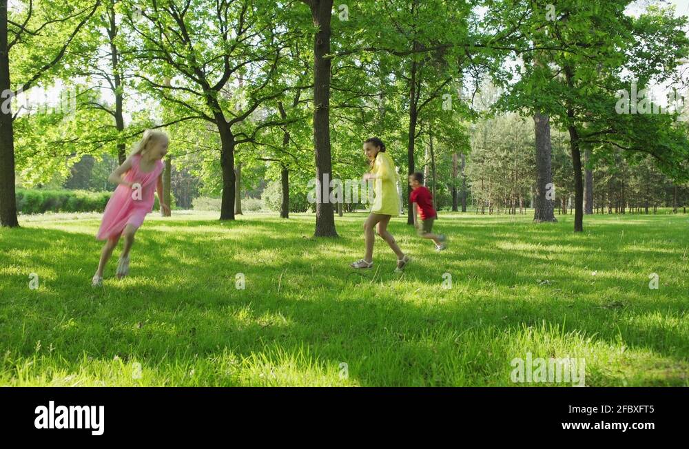 Kids playing tag Stock Videos & Footage - HD and 4K Video Clips - Alamy