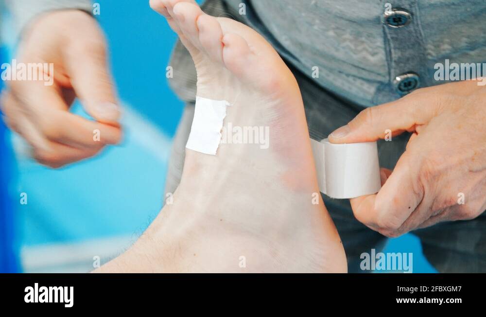 First aid plaster Stock Videos & Footage - HD and 4K Video Clips - Alamy