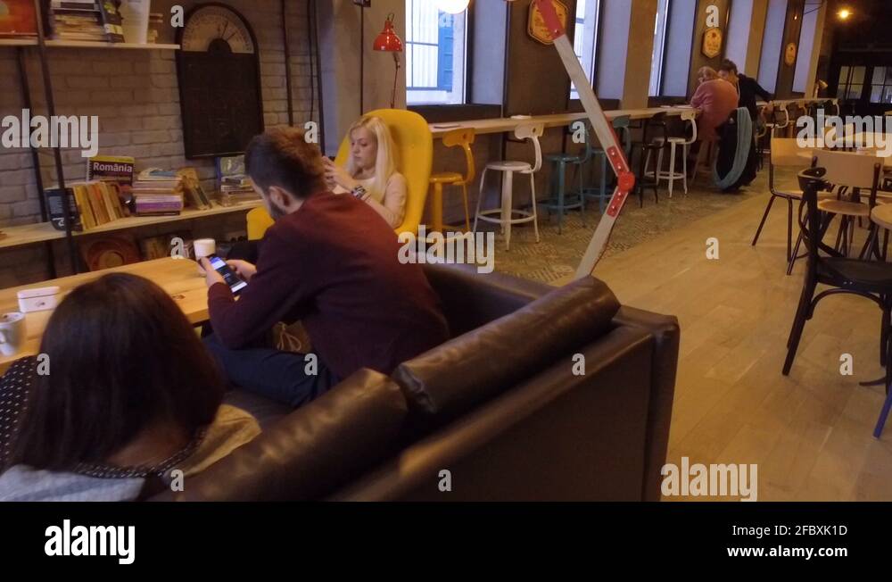 People sitting in a cafe Stock Videos & Footage - HD and 4K Video Clips ...