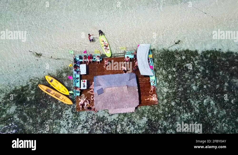 Aerial of People Relaxing on Floating Bar in Ocean Water of Palawan ...