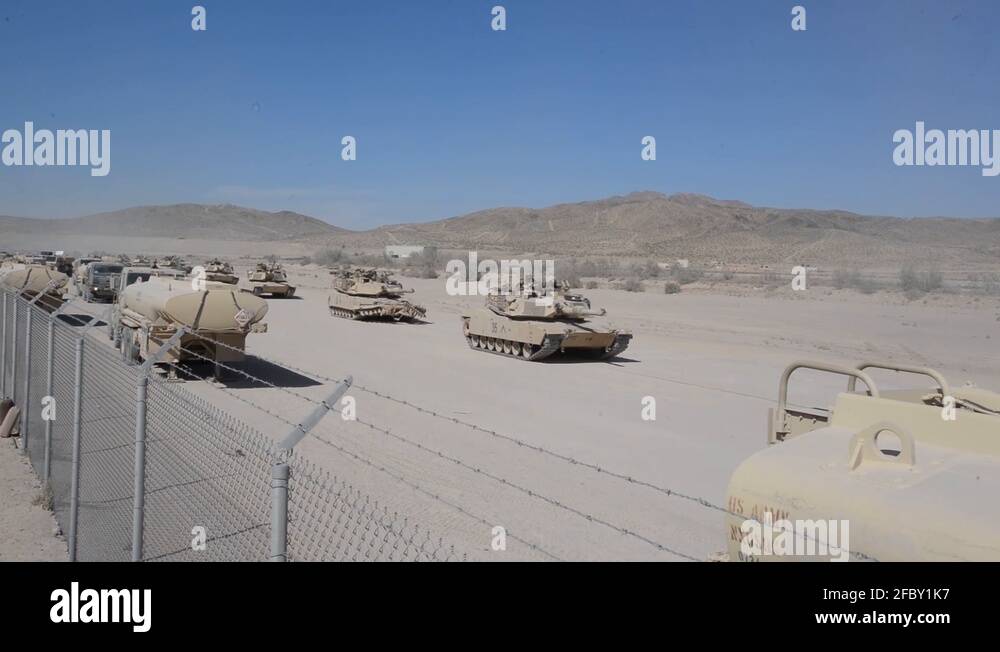 Battle tanks and fuel tankers parked at Fort Irwin Stock Video Footage ...