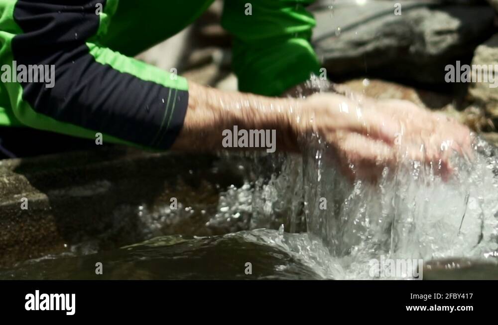 Water splashing face Stock Videos & Footage - HD and 4K Video Clips - Alamy