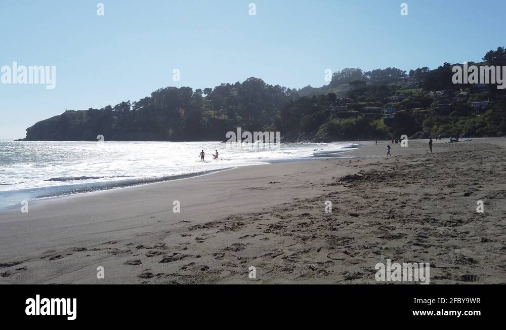 Family playing in ocean surf Stock Videos & Footage - HD and 4K Video ...