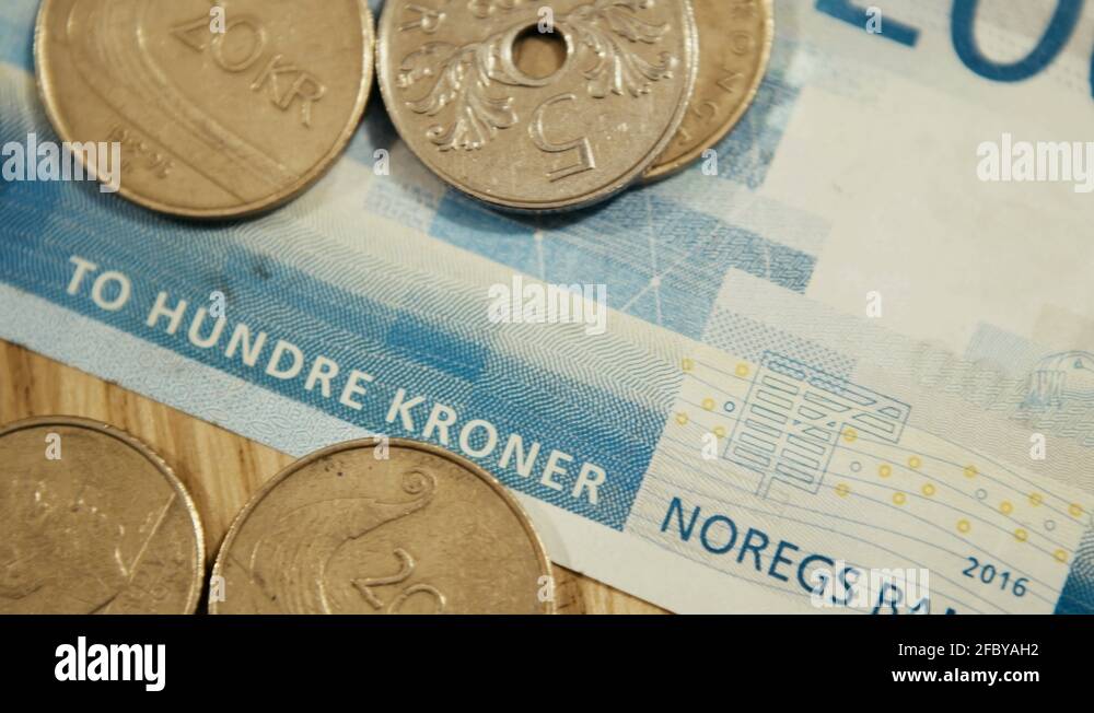 Norwegian kroner coins above one to hundre kroner ( 200 kroner ...