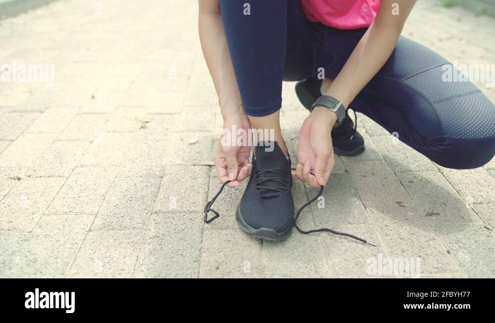 Runner is tying shoes Stock Videos & Footage - HD and 4K Video Clips ...