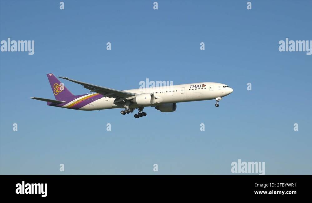 airplane thai airways boeing 777 side view super slow motion panning ...