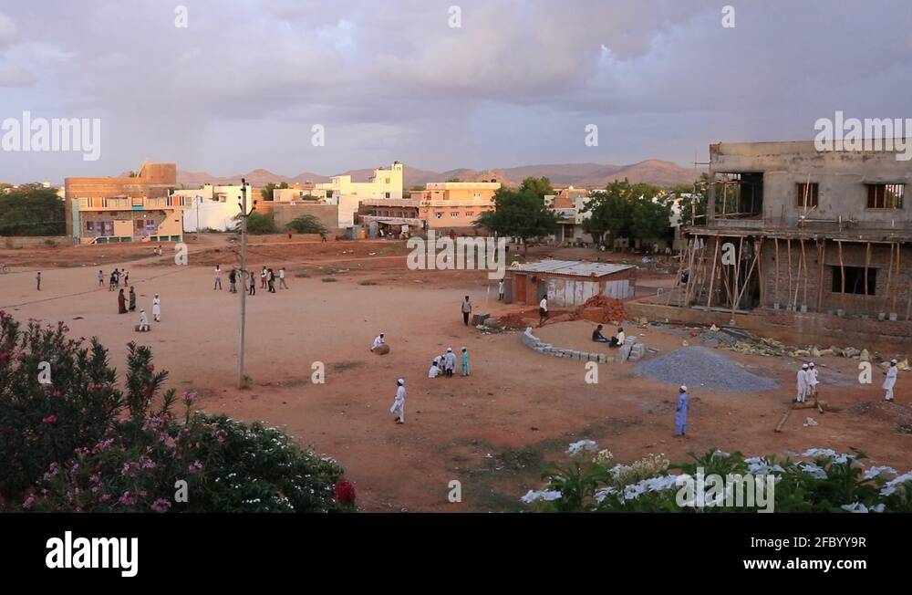 Time laps of kids playing around in a open place in India Stock Video ...