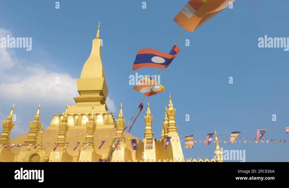 Video of Laos flags waving in front of the Pha That Luang Temple ...