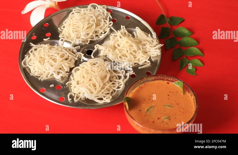 Idiyappam/ String Hoppers -Traditional Kerala Steamed Breakfast on red ...