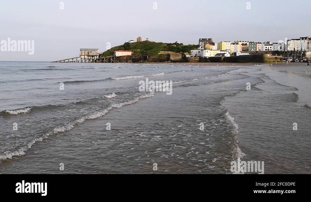 Tenby beach, with houses and lifeboat station. Static Stock Video ...