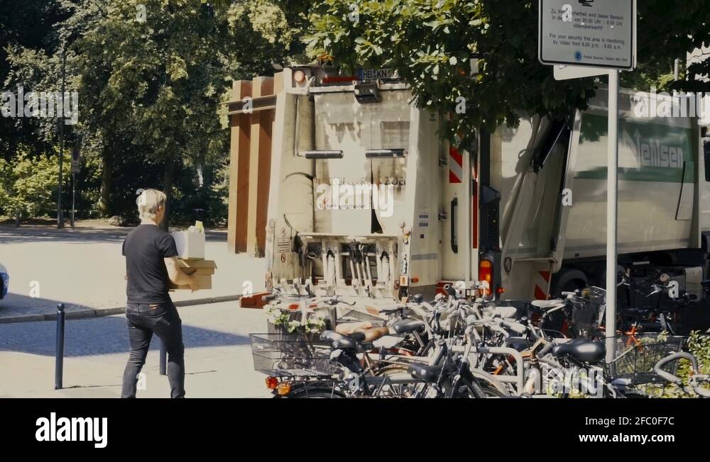 Garbage man on truck Stock Videos & Footage - HD and 4K Video Clips - Alamy
