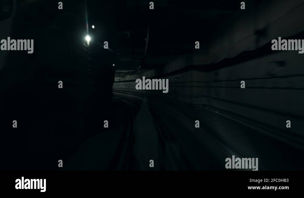 Train moving inside deep dark underground tunnel. Metro tunnel ...