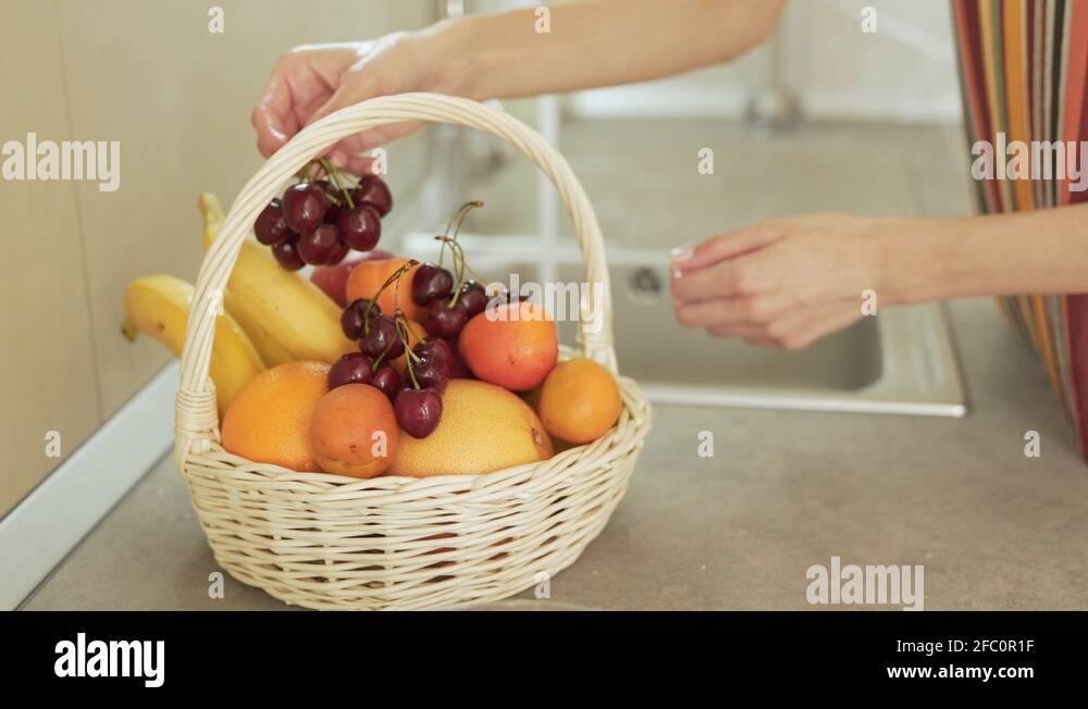 Hands washing fruit Stock Videos & Footage - HD and 4K Video Clips - Alamy