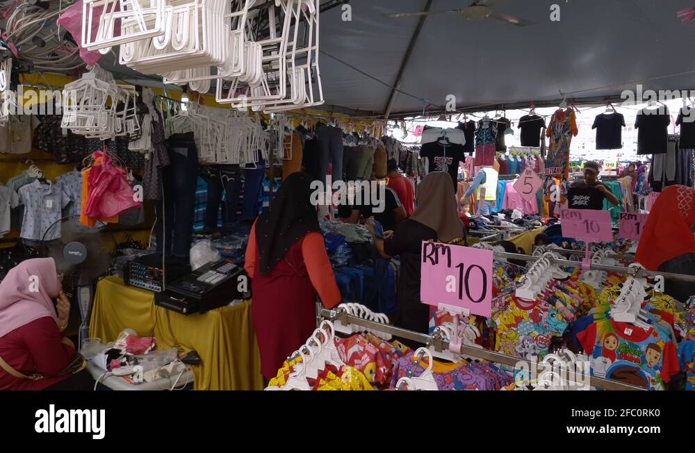 A colorful shop-stall in an open air bazaar in Malaysia selling ...