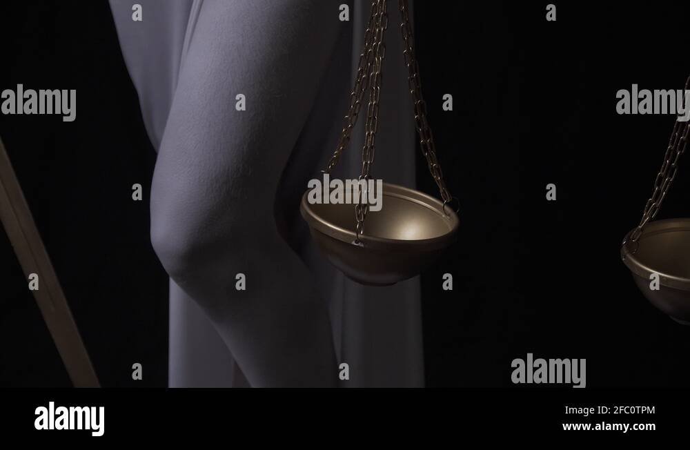 Close up of the human statue of Themis lifting up the scales, 4k Stock ...