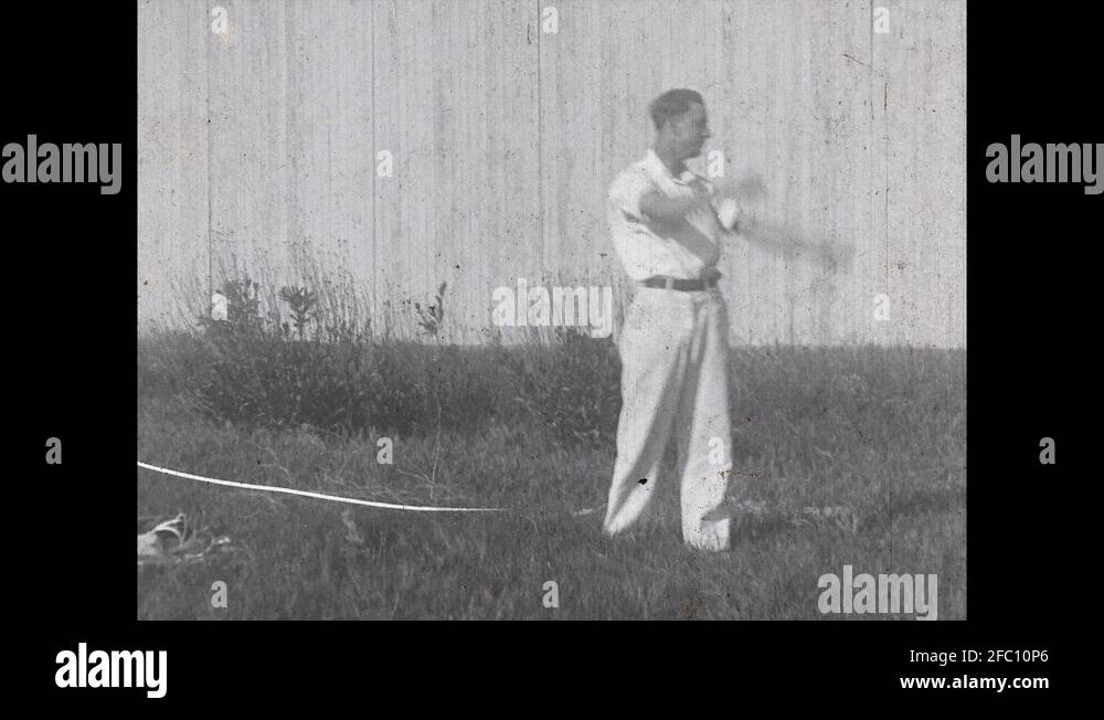 1920s: Field, man waves arms, man bows, does self-clasping handshake ...