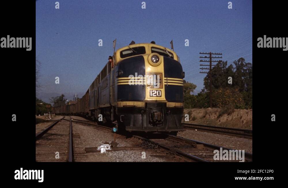 1950s: UNITED STATES: train on track. Front view of train. Side view of ...