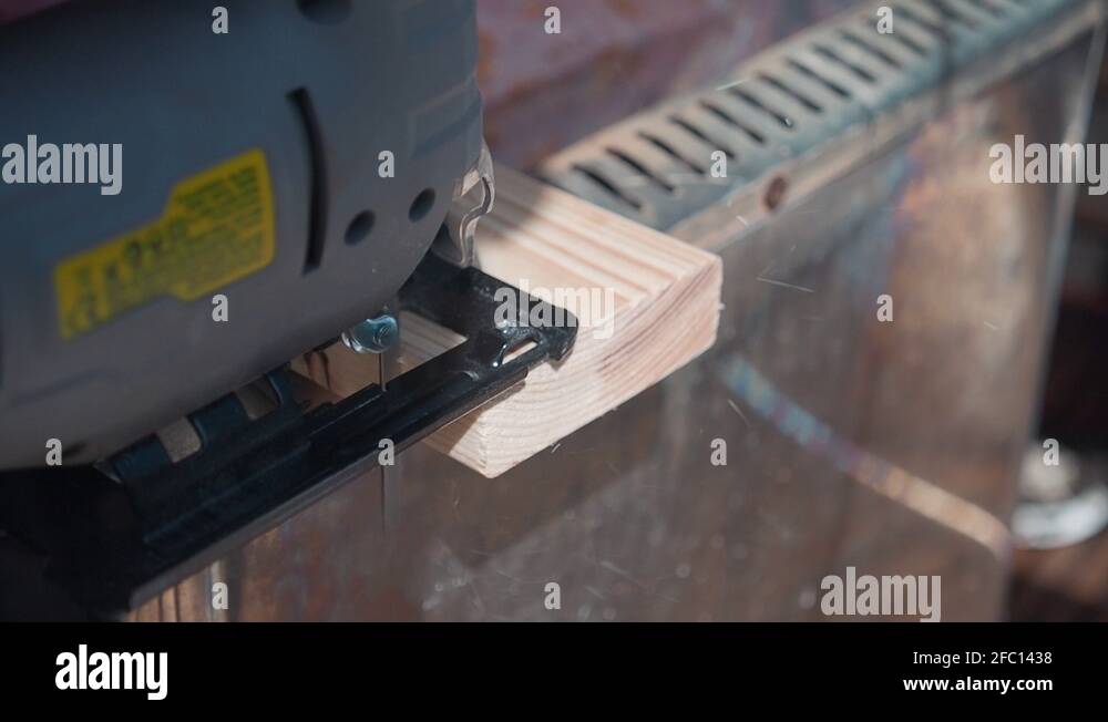 Cutting timber with a circular saw. Wood. Professional carpenter. Power ...