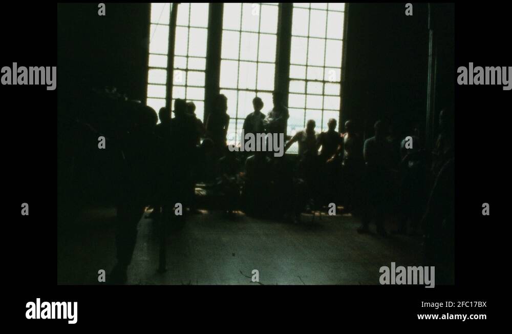 1970s: Group of people stand by window in boxing gym Stock Video ...