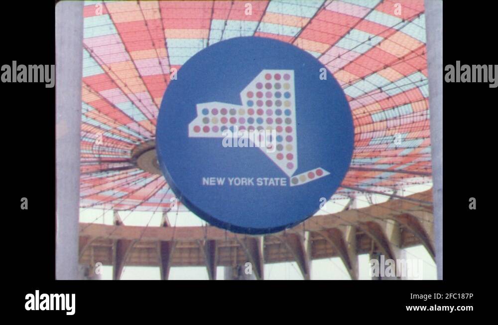 1960s: Sign for New York state. People walk across map. Elevator goes ...