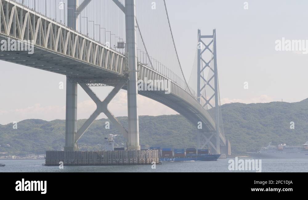 Container ship under Akashi Kaikyo bridge,Akashi,Kansai,Japan Stock ...