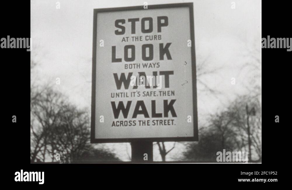 1950s: Sign: Stop, Look, Wait, Walk. Neighborhood sidewalk, safety ...