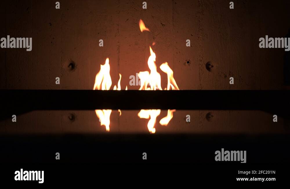 Different angles of artificial fire burning giving a modern, rusty ...